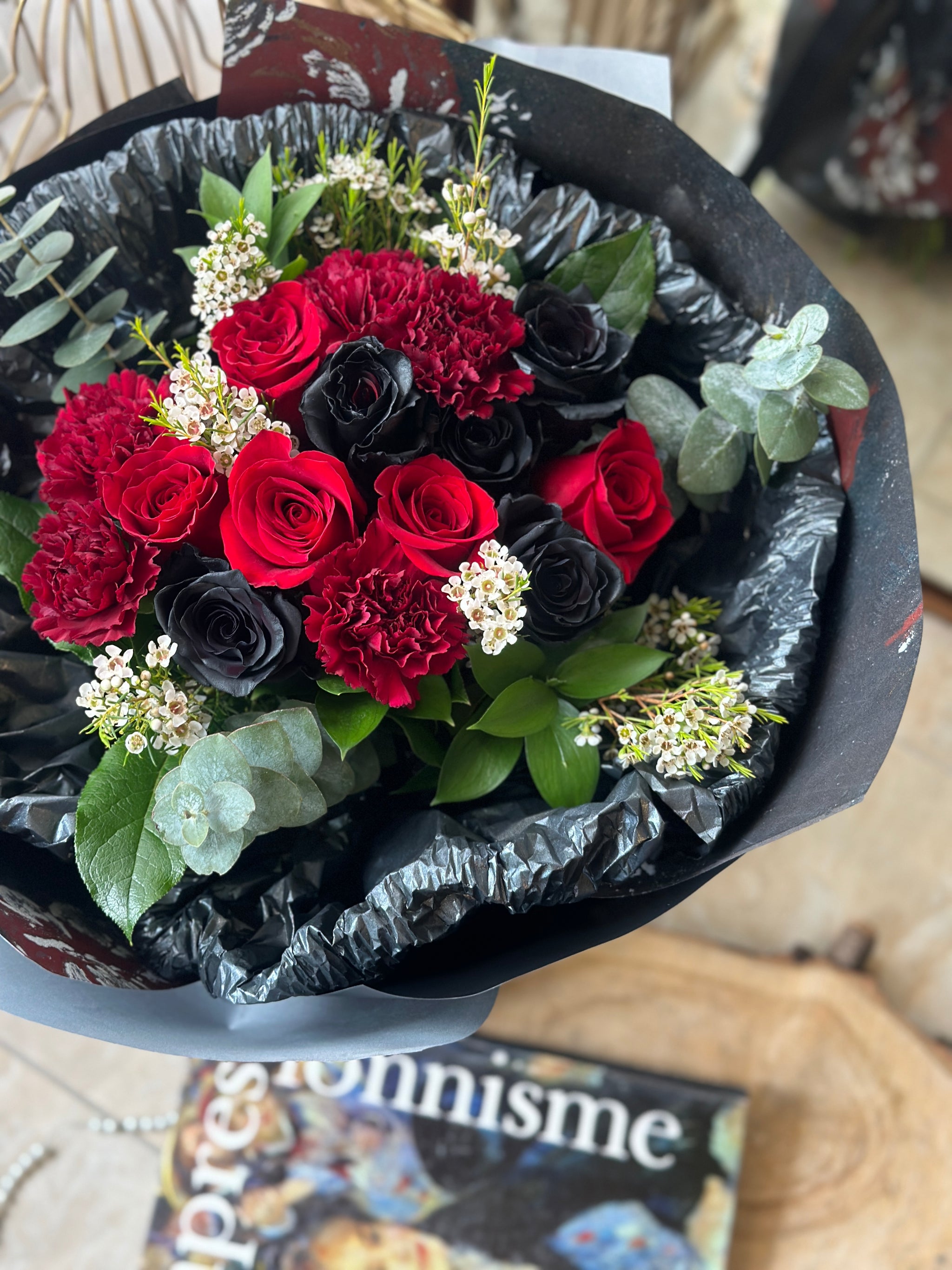 Red white and black flower bouquets store